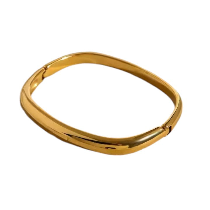GOLDEN CREST BANGLE | SEA BONES